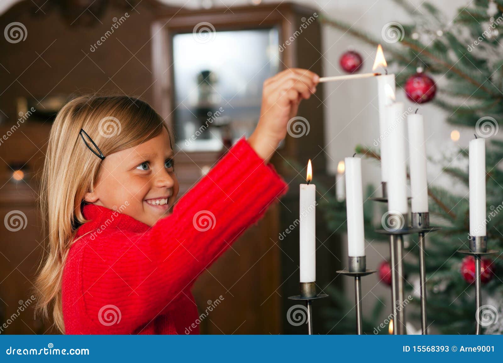 Child Lighting Christmas Candles Stock Image - Image of girl, christmas ...