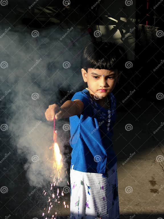 Child Lighting the Fire Cracker Stock Photo - Image of cracker ...
