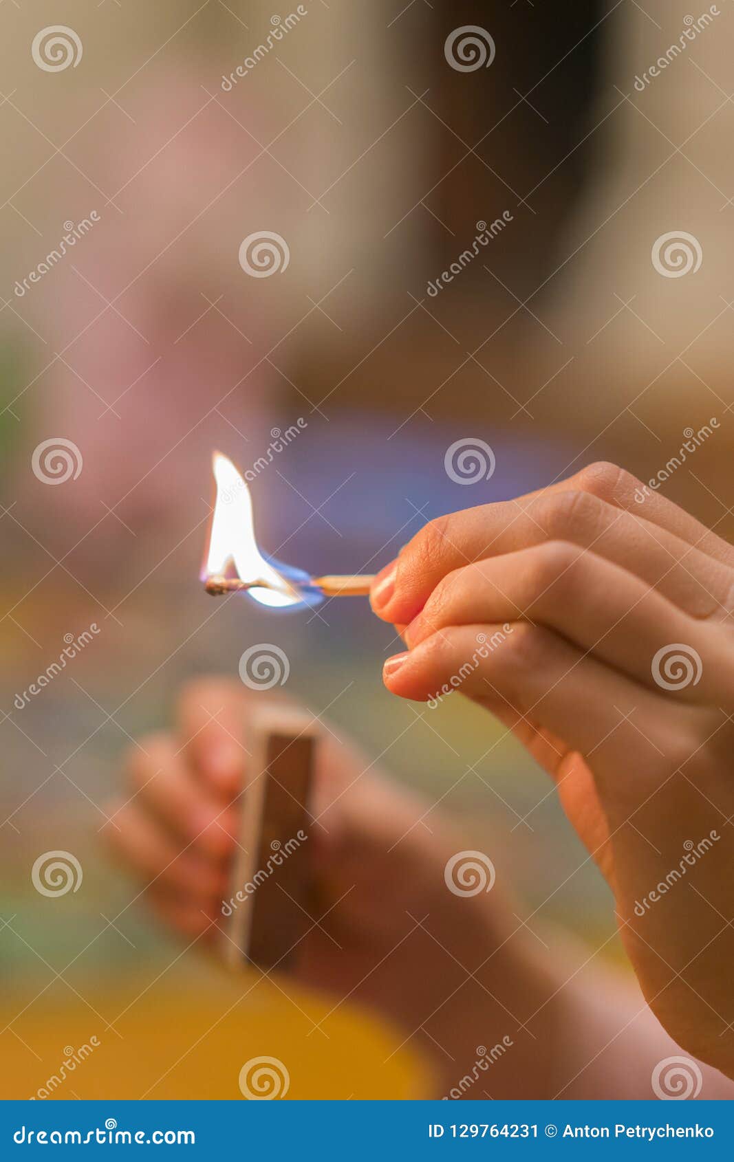 The Child Lighting the Matches. the Fire in the Hands of a Child Stock ...
