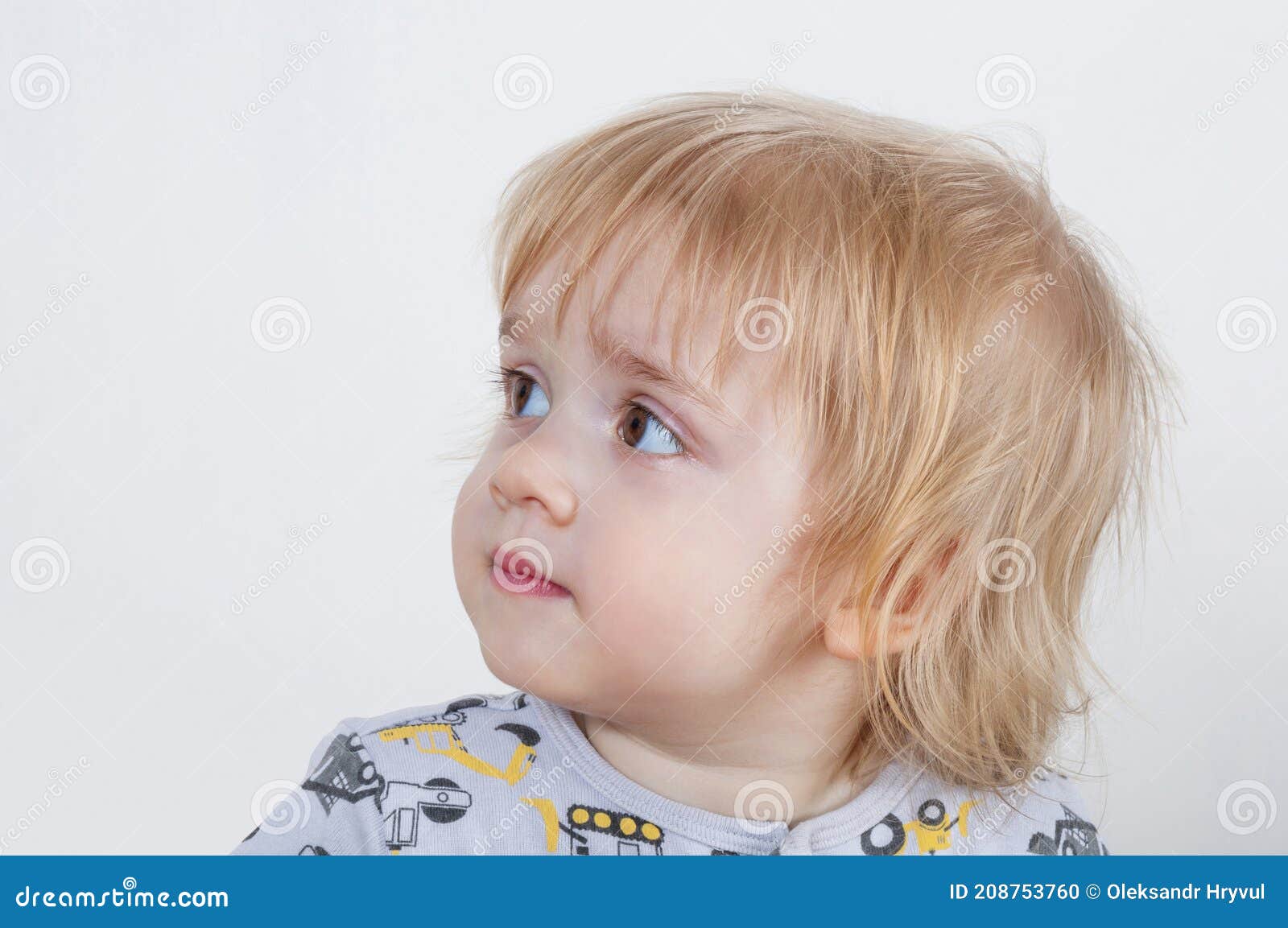 Child Looking Carefully with Interest and Smiling. Light Background ...