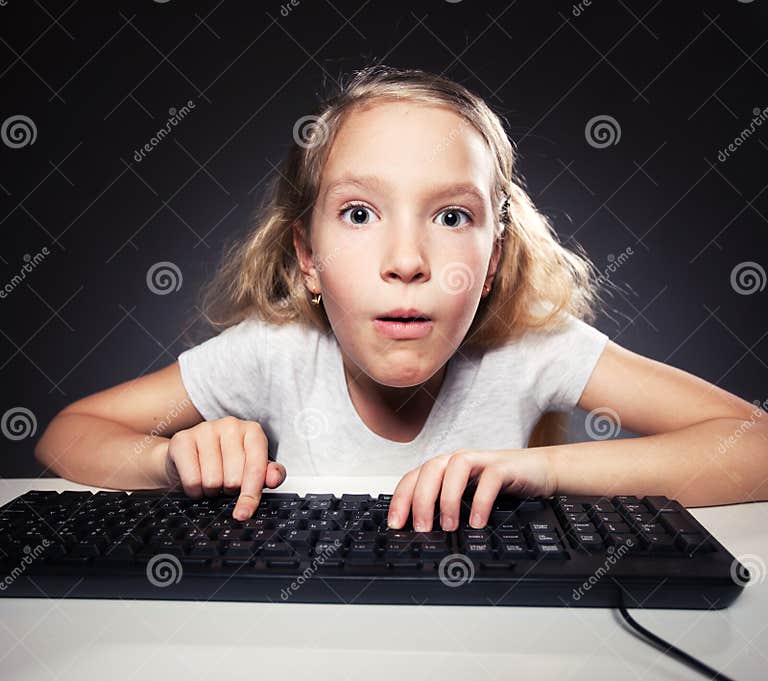 Child looking at computer stock image. Image of computer - 71433577