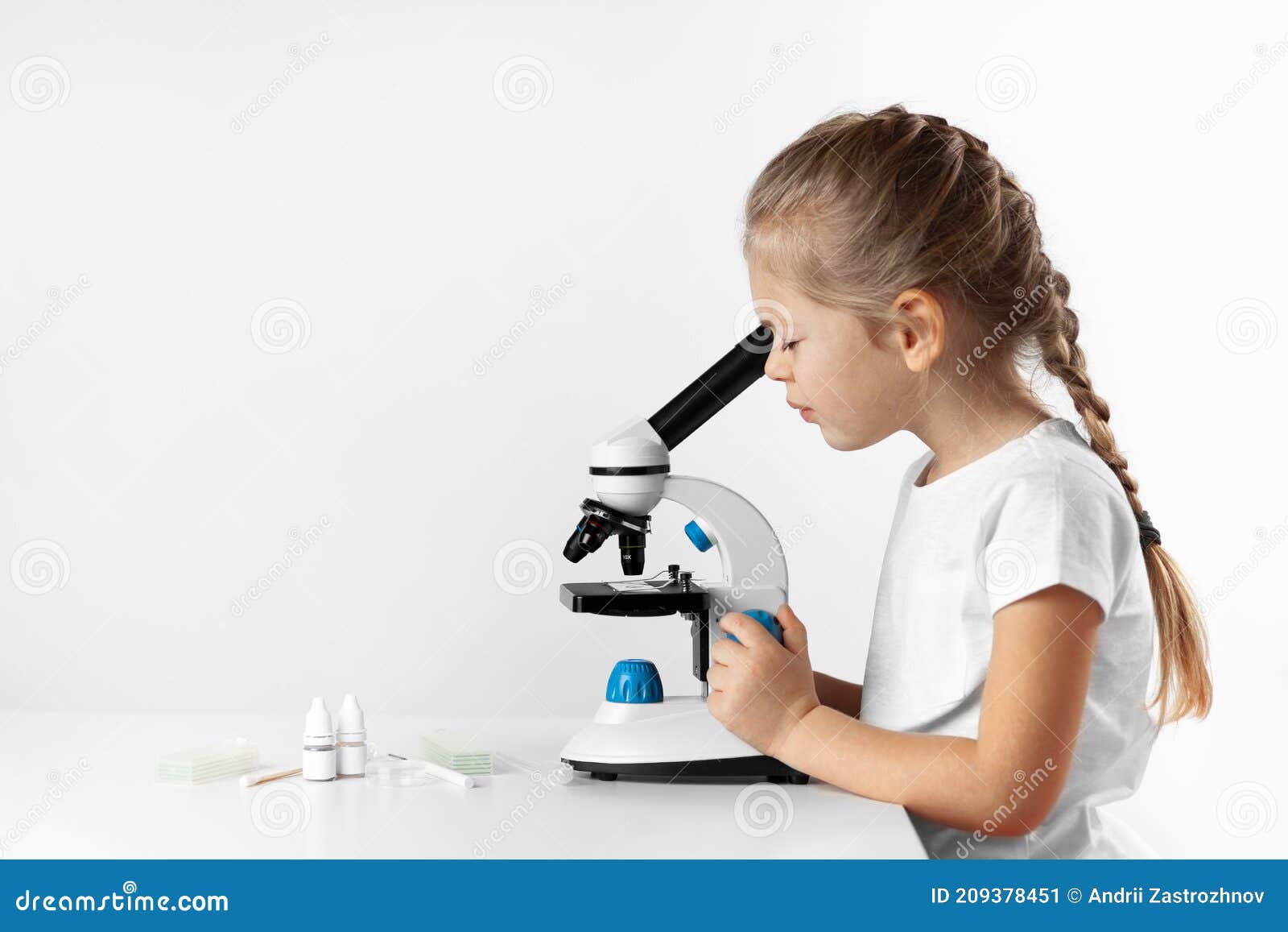 Child Looking through Microscope on White Background. Kid Scientist ...