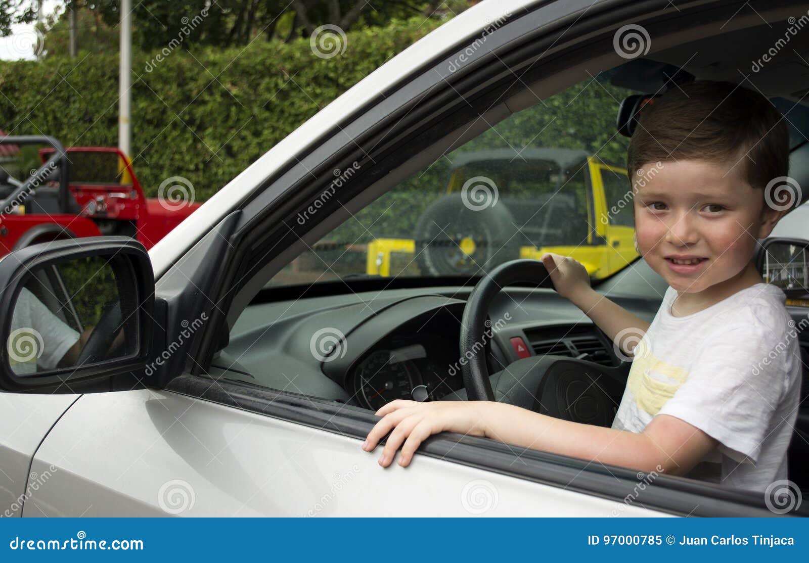 Child looking out of a car stock image. Image of drive - 97000785