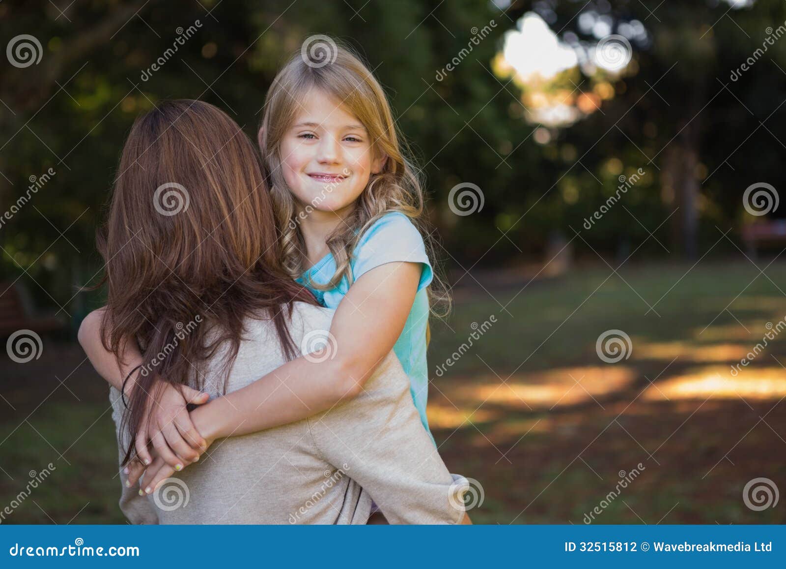 Child Looking Over Her Mothers Shoulder Stock Photo - Image of looking ...