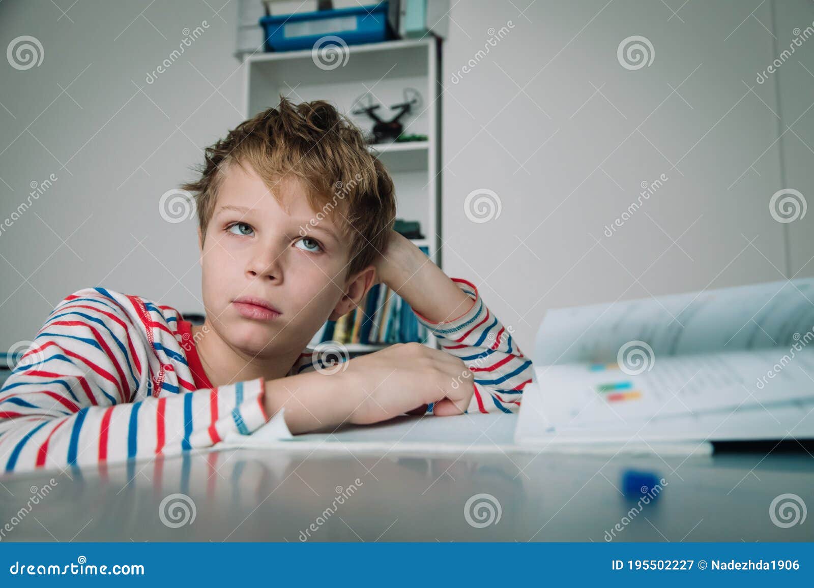 Child Looking Puzzled, Kid Tired and Bored of Doing Homework Stock ...