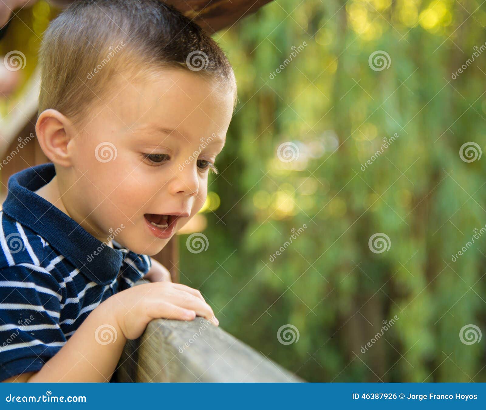 Child Looking through a Railing Stock Photo - Image of child, cool ...
