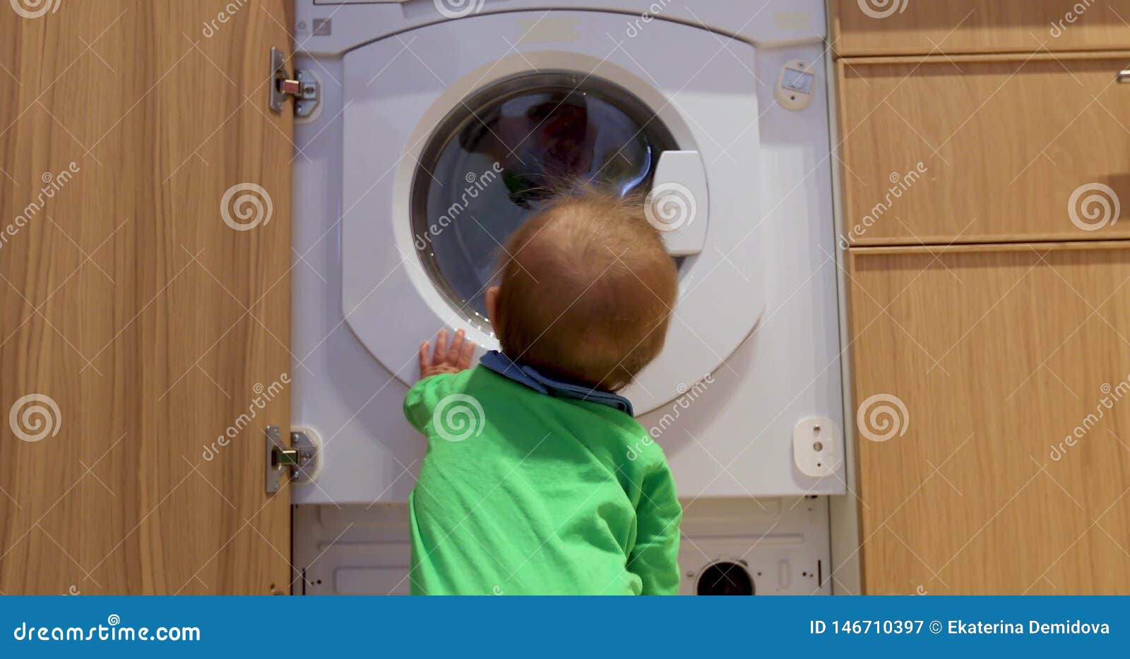 Child is Looking into the Washing Machine Stock Video - Video of ...