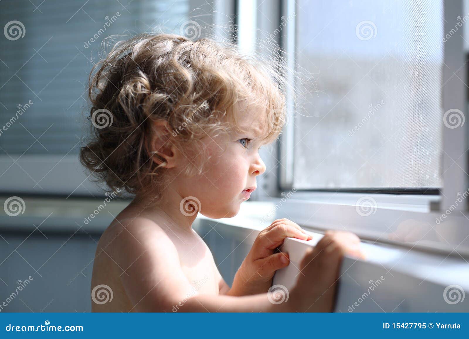 Child looking into window stock image. Image of blond - 15427795