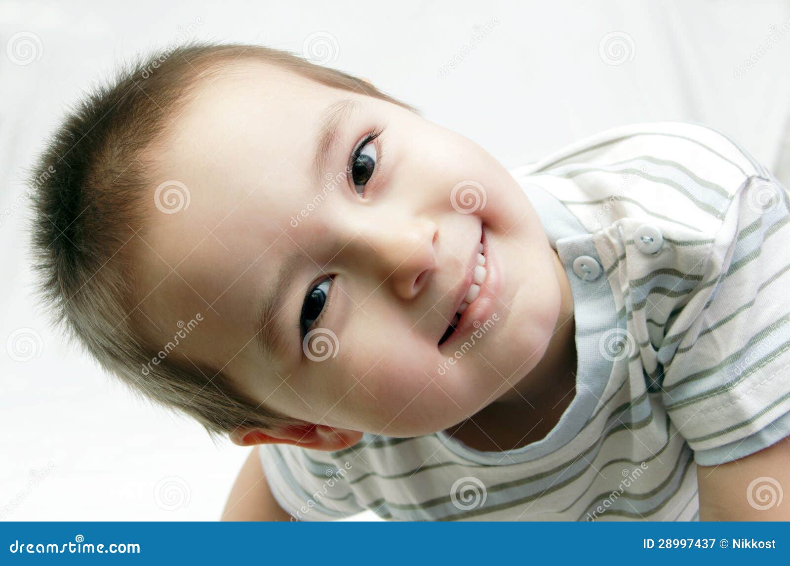 Child looks in the camera stock image. Image of face - 28997437