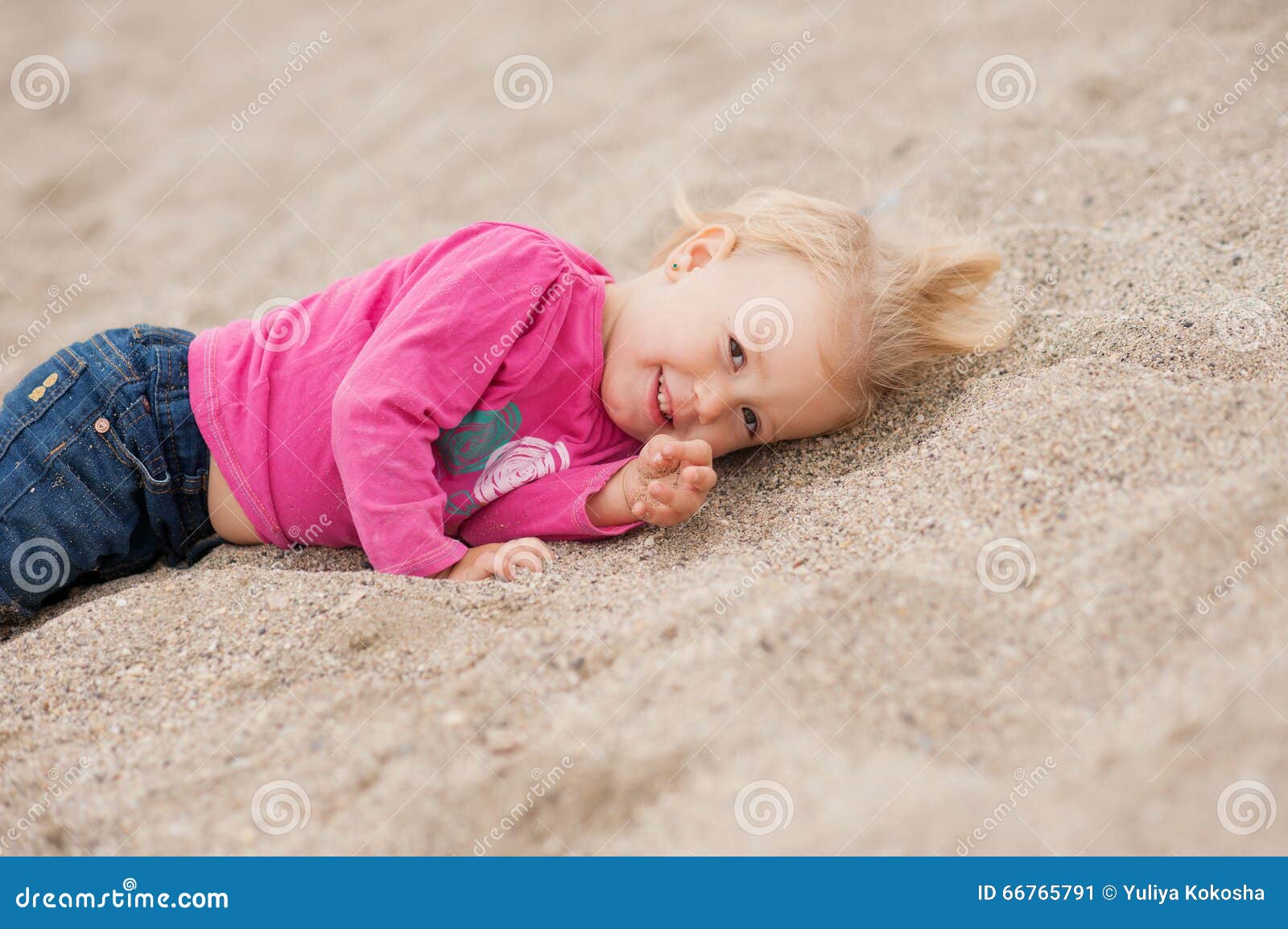 Child is Lying on the Beach Stock Image - Image of little, child: 66765791