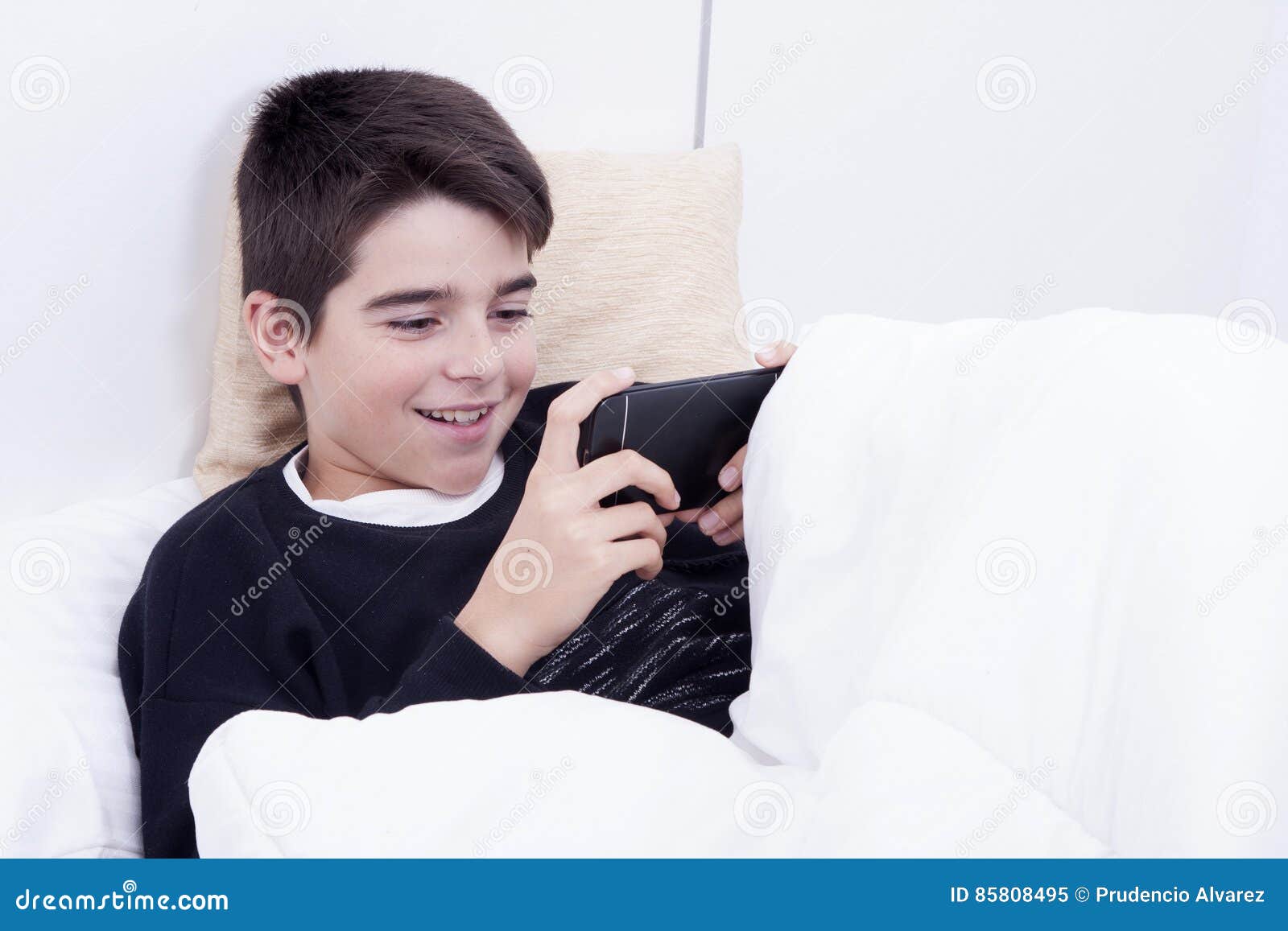Child Lying Down with the Telephone Stock Image - Image of technology ...