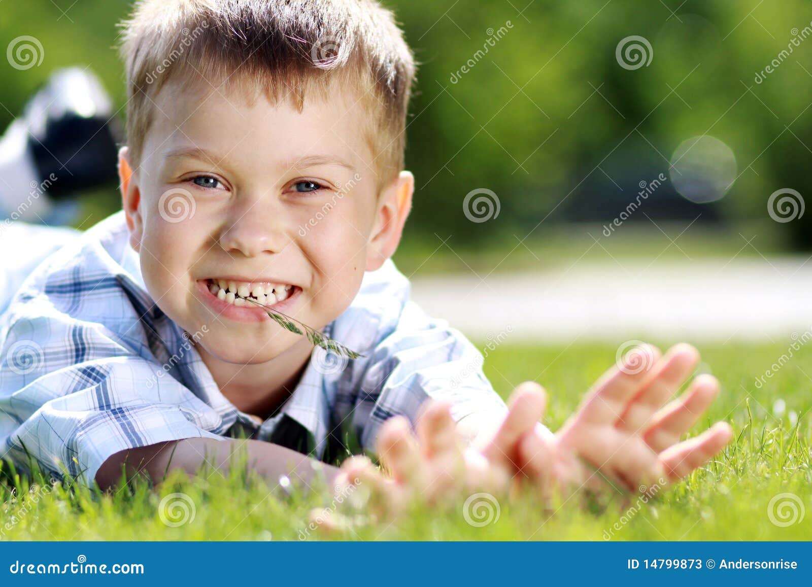 Child lying on the grass. stock image. Image of rest - 14799873