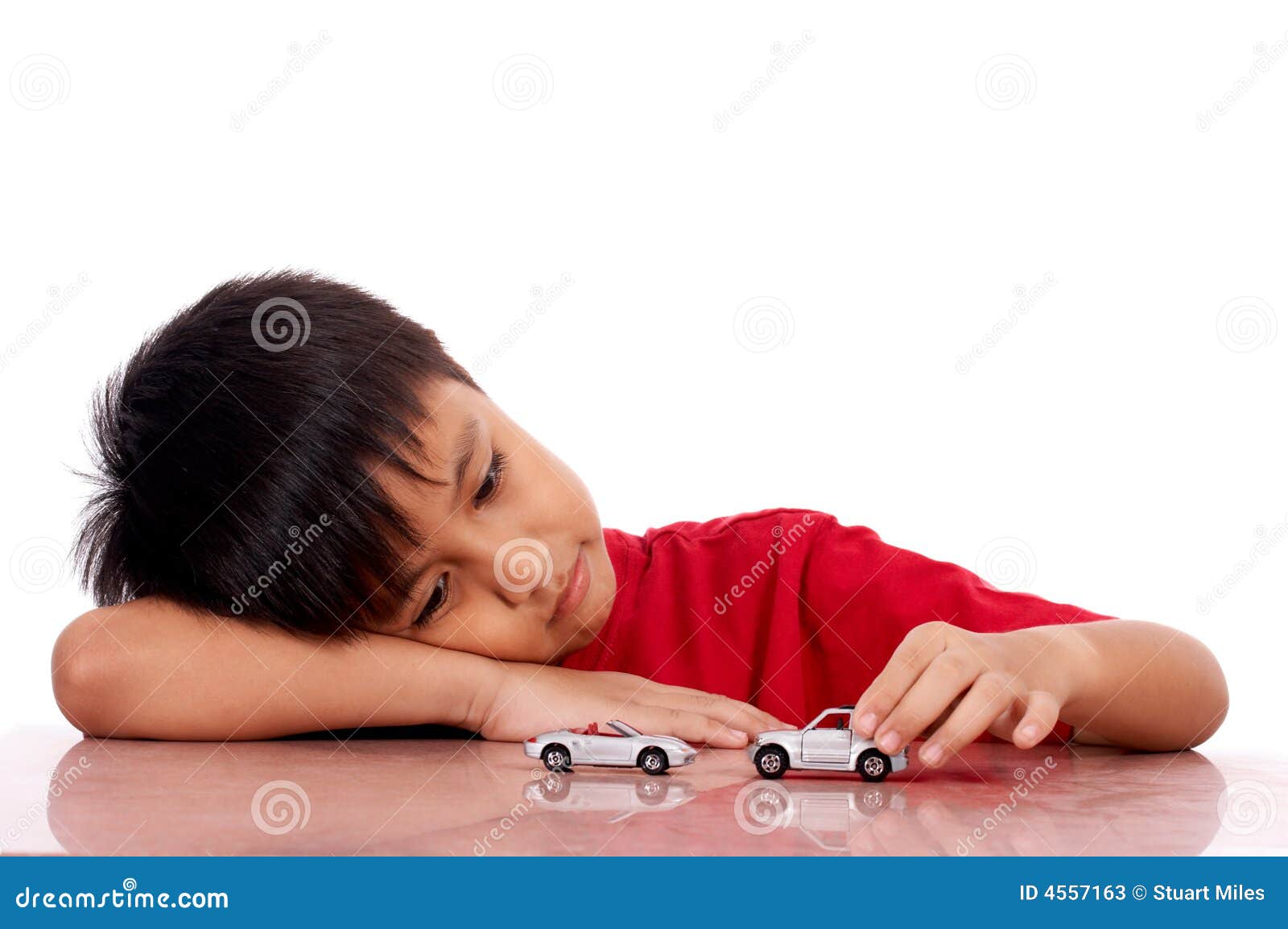 Child lying on the table stock image. Image of play, table - 4557163
