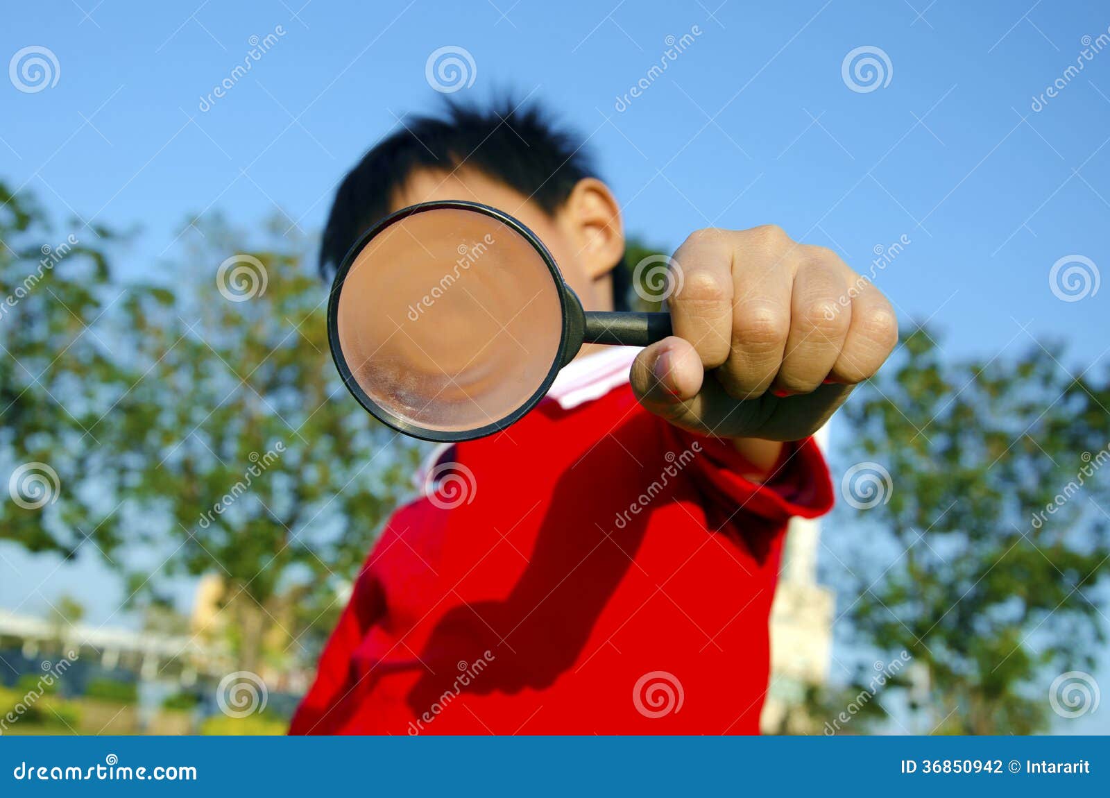 Child with a Magnifying Glass Stock Photo - Image of looking, face ...