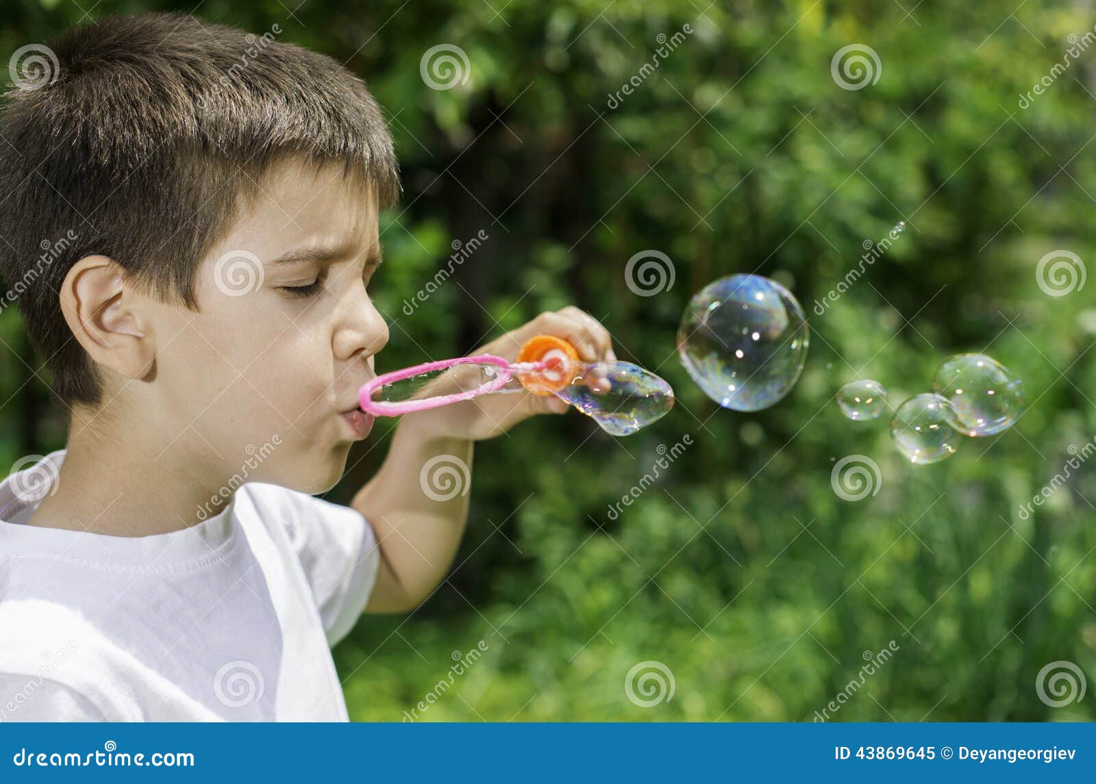 Child makes bubbles stock image. Image of young, five - 43869645