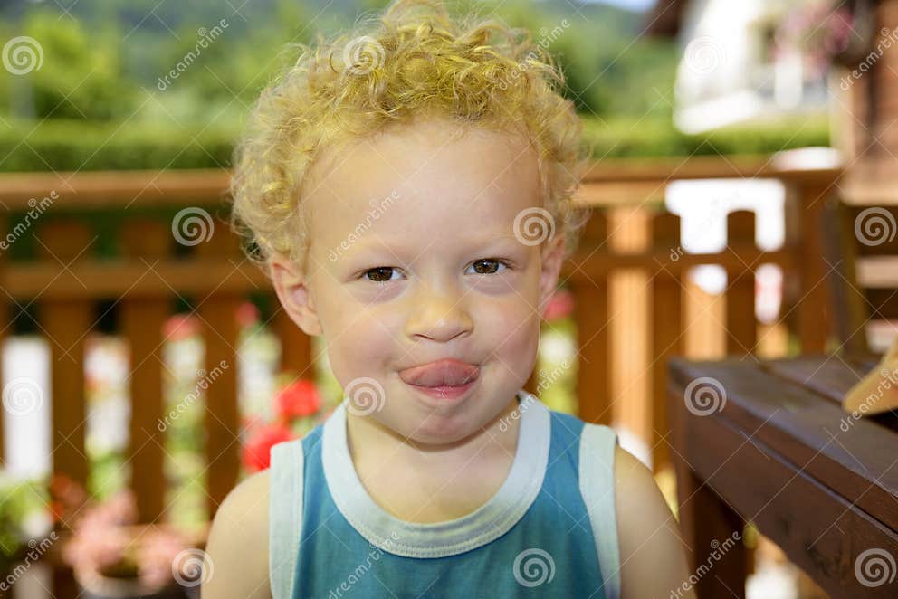 Child makes a grimace stock photo. Image of cute, emotion - 41656892