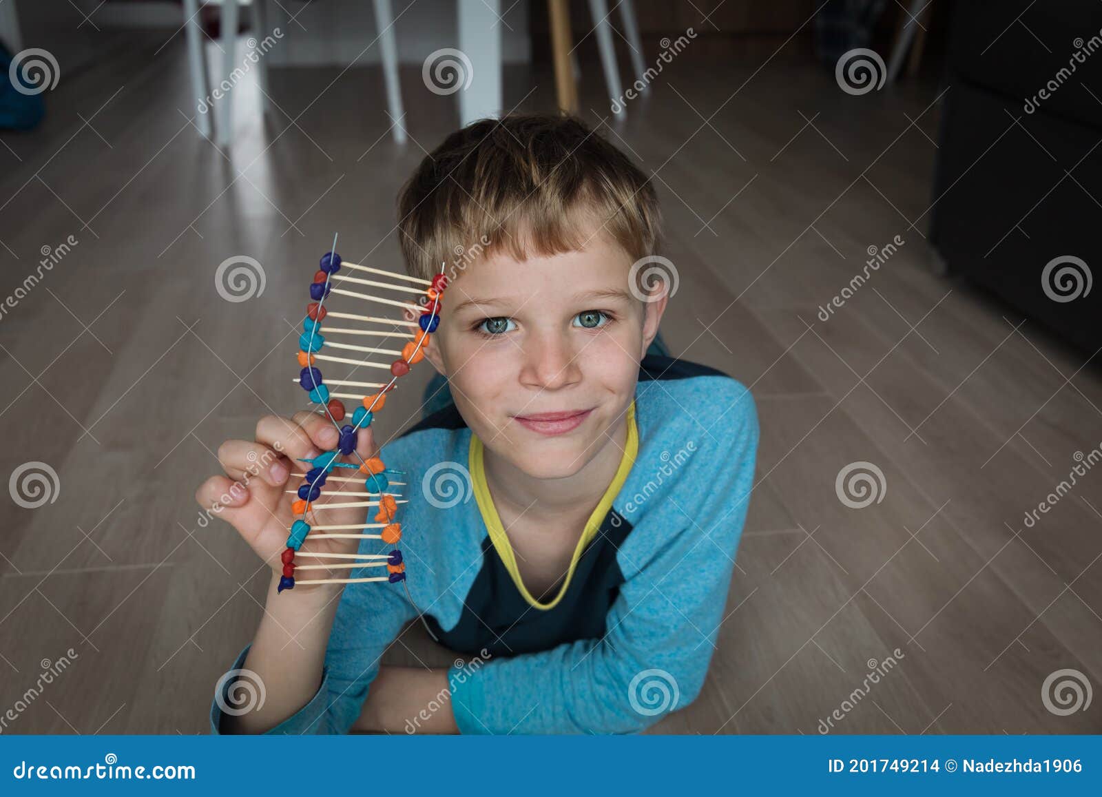 Child Making DNA Model from Sticks and Clay, Engineering and STEM Stock ...