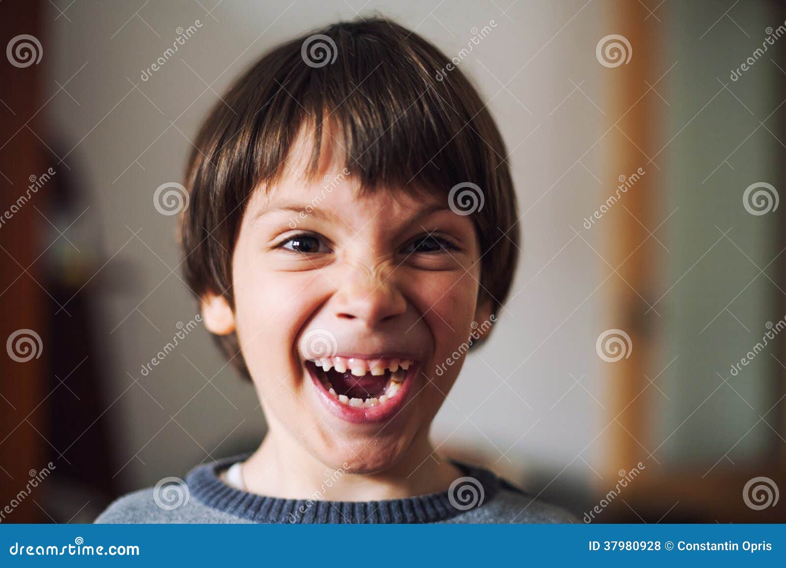 Child making funny face stock photo. Image of portrait - 37980928