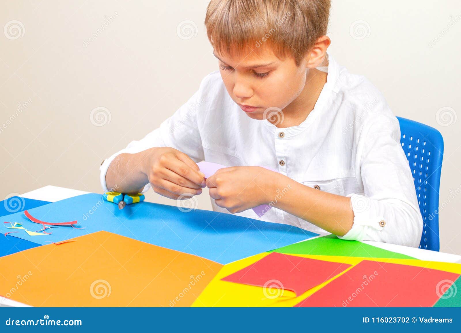 Child Making Greeting Card with Colored Paper at the Table Stock Photo ...
