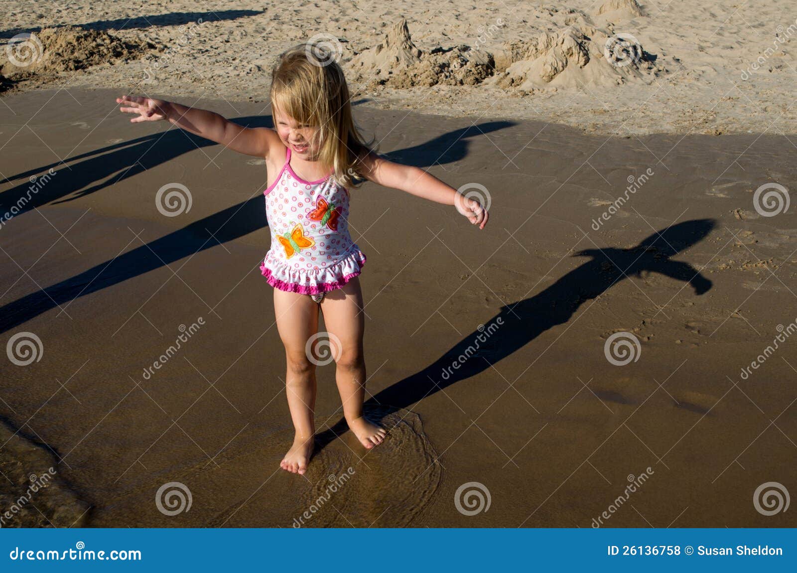 Child making Shadows stock photo. Image of beach, summer - 26136758