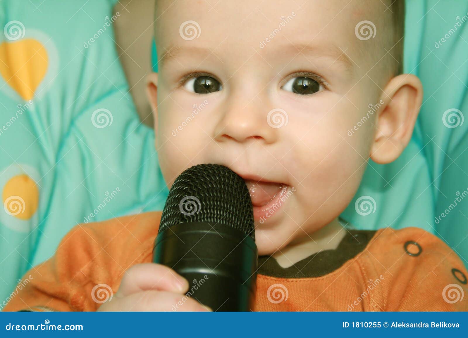 The Child with a Microphone Stock Image - Image of months, person: 1810255