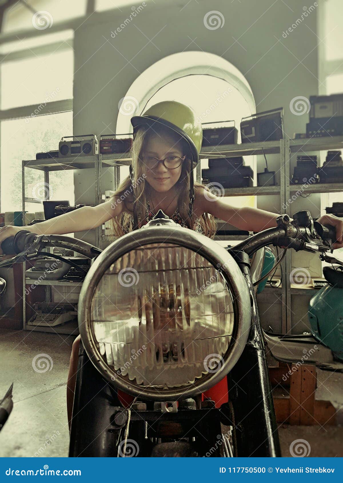 Child on a Motorcycle in a Helmet Stock Photo - Image of background ...