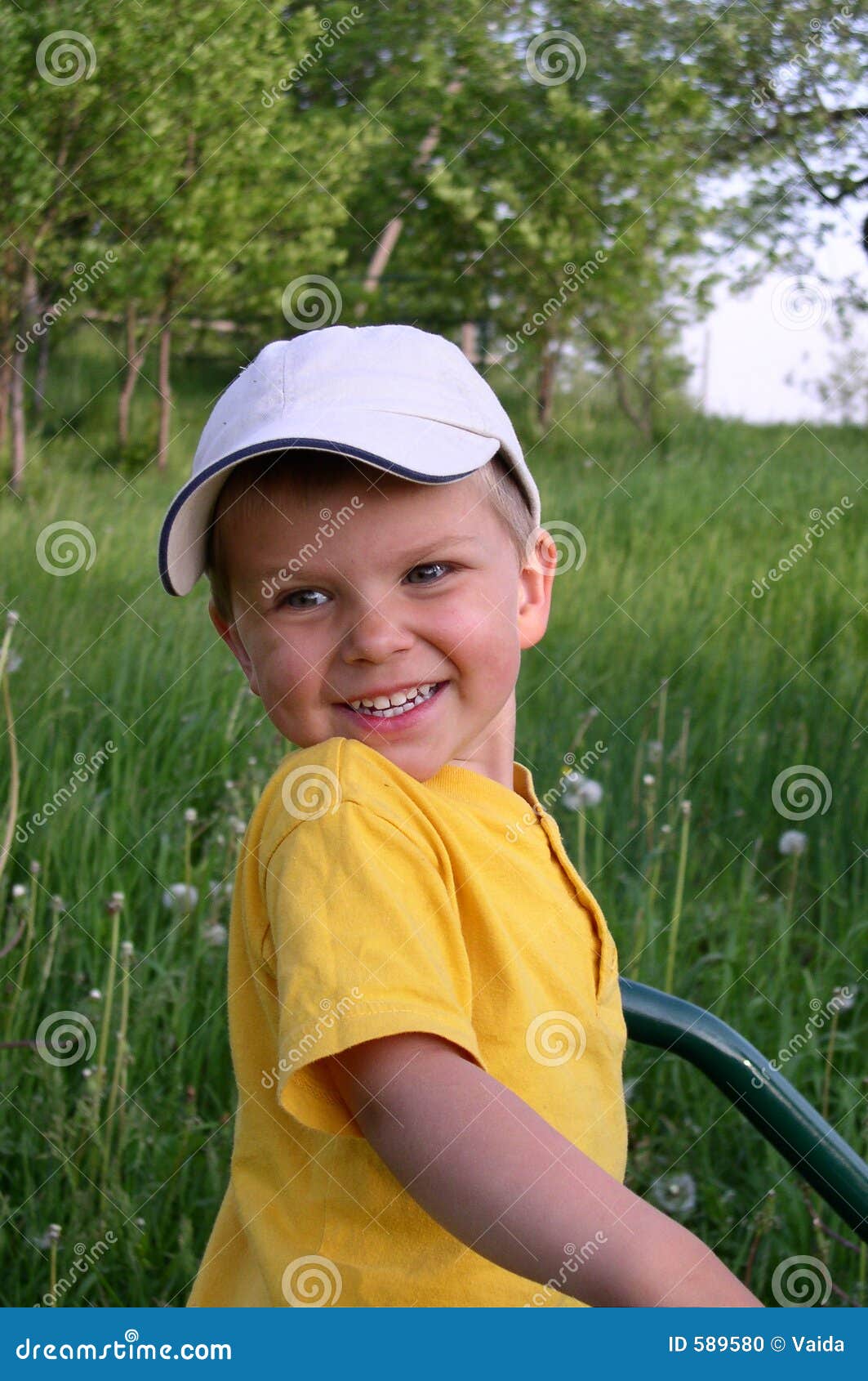 Child in Nature stock photo. Image of greenness, smiling - 589580