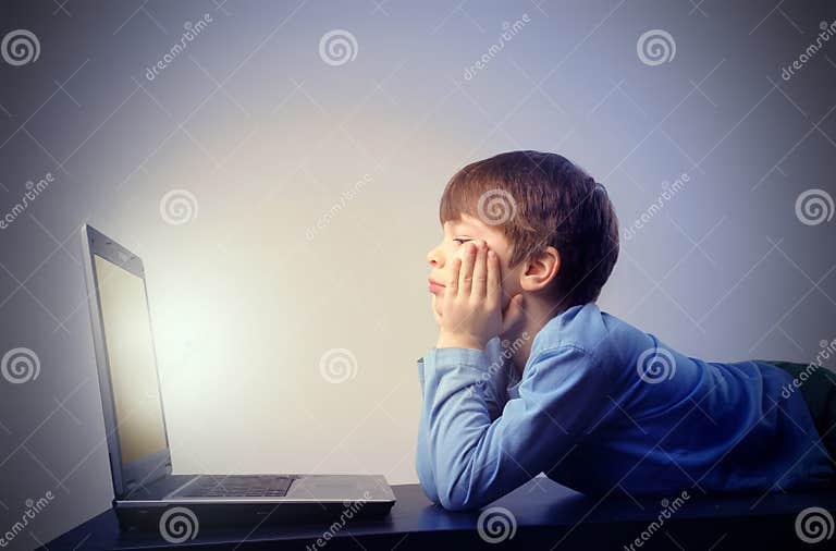 Child observing laptop stock image. Image of technolgy - 12502789