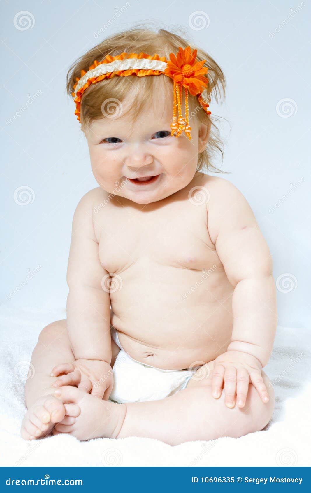 Child with Orange Frontlet on Her Head Stock Image - Image of ...