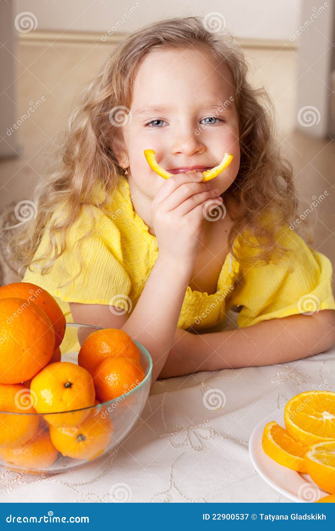 Child with oranges stock image. Image of camera, children - 22900537