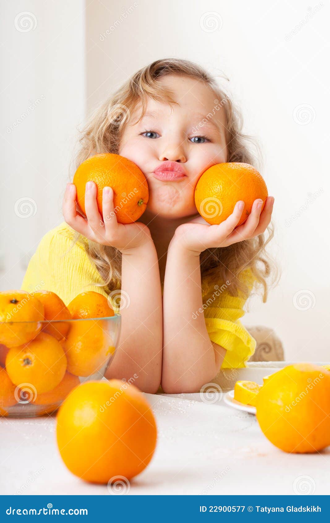 Child with oranges stock image. Image of orange, happiness - 22900577