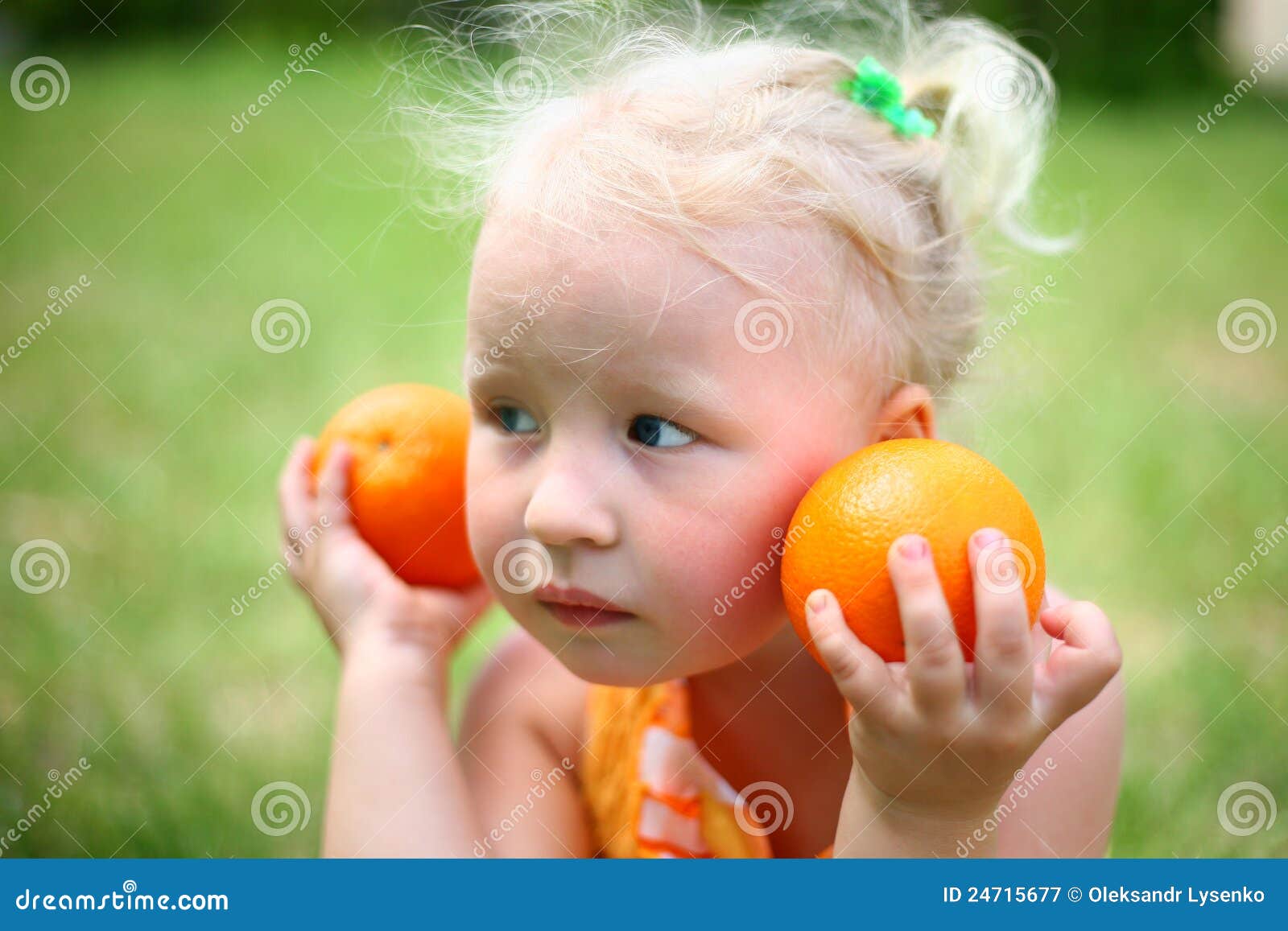 A child with oranges stock image. Image of orange, green - 24715677
