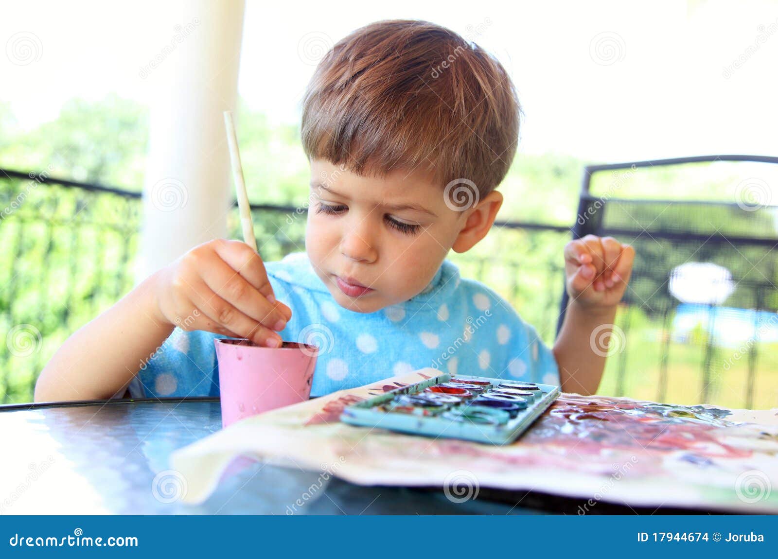 Child with paintbrush stock photo. Image of childhood - 17944674