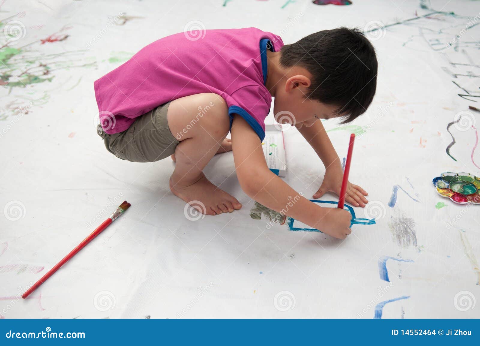 The child is painting stock photo. Image of painting - 14552464