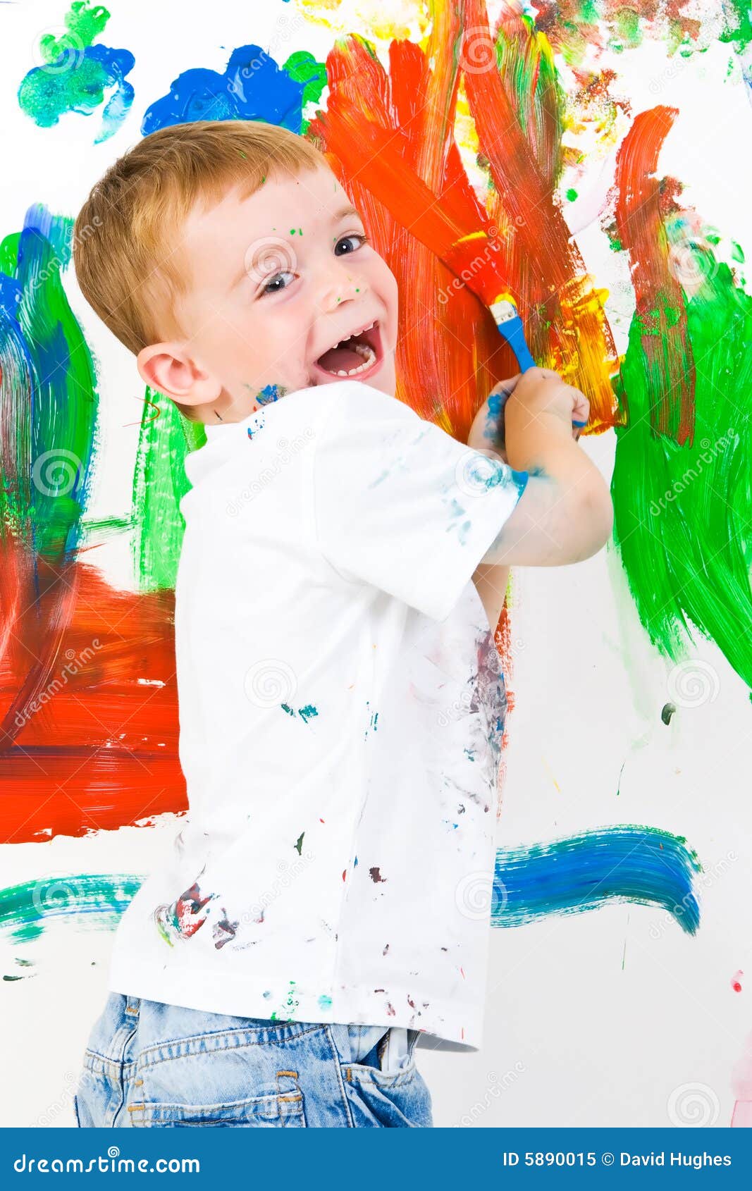 Child Painting and Having Fun Stock Image - Image of paint, wall: 5890015