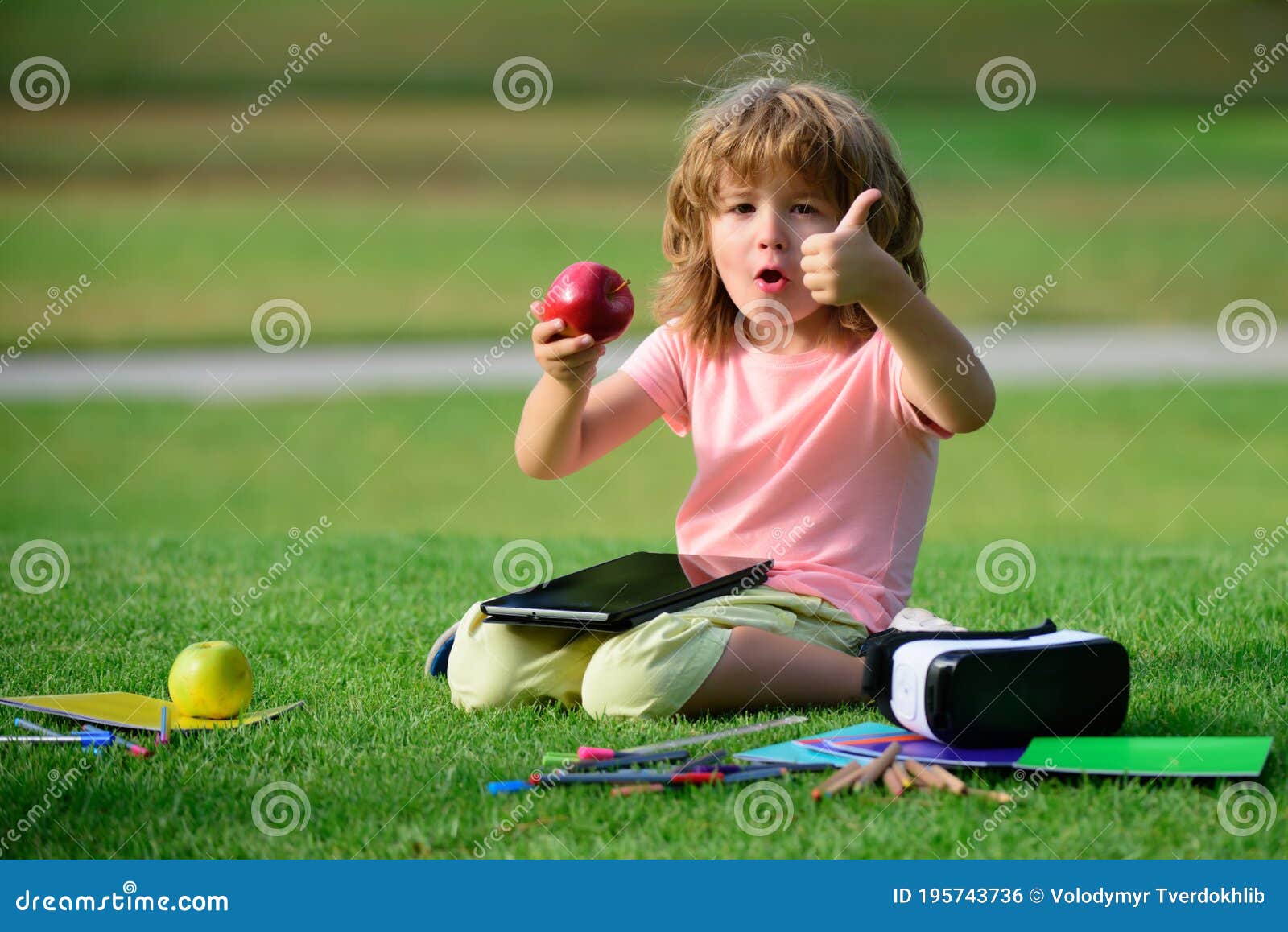 Child in Park Reading for Education. Home Outside Learning. Stock Photo ...