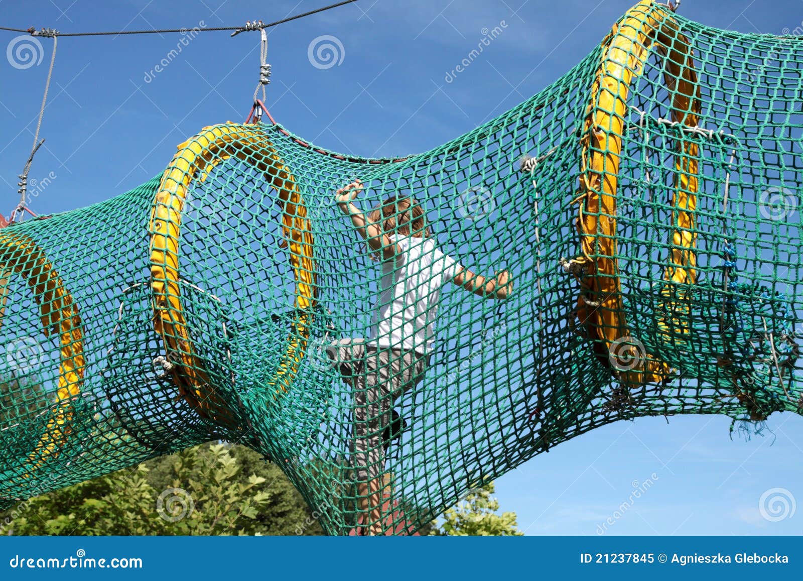 The Child Passes through the Mesh. Playground Stock Image - Image of ...