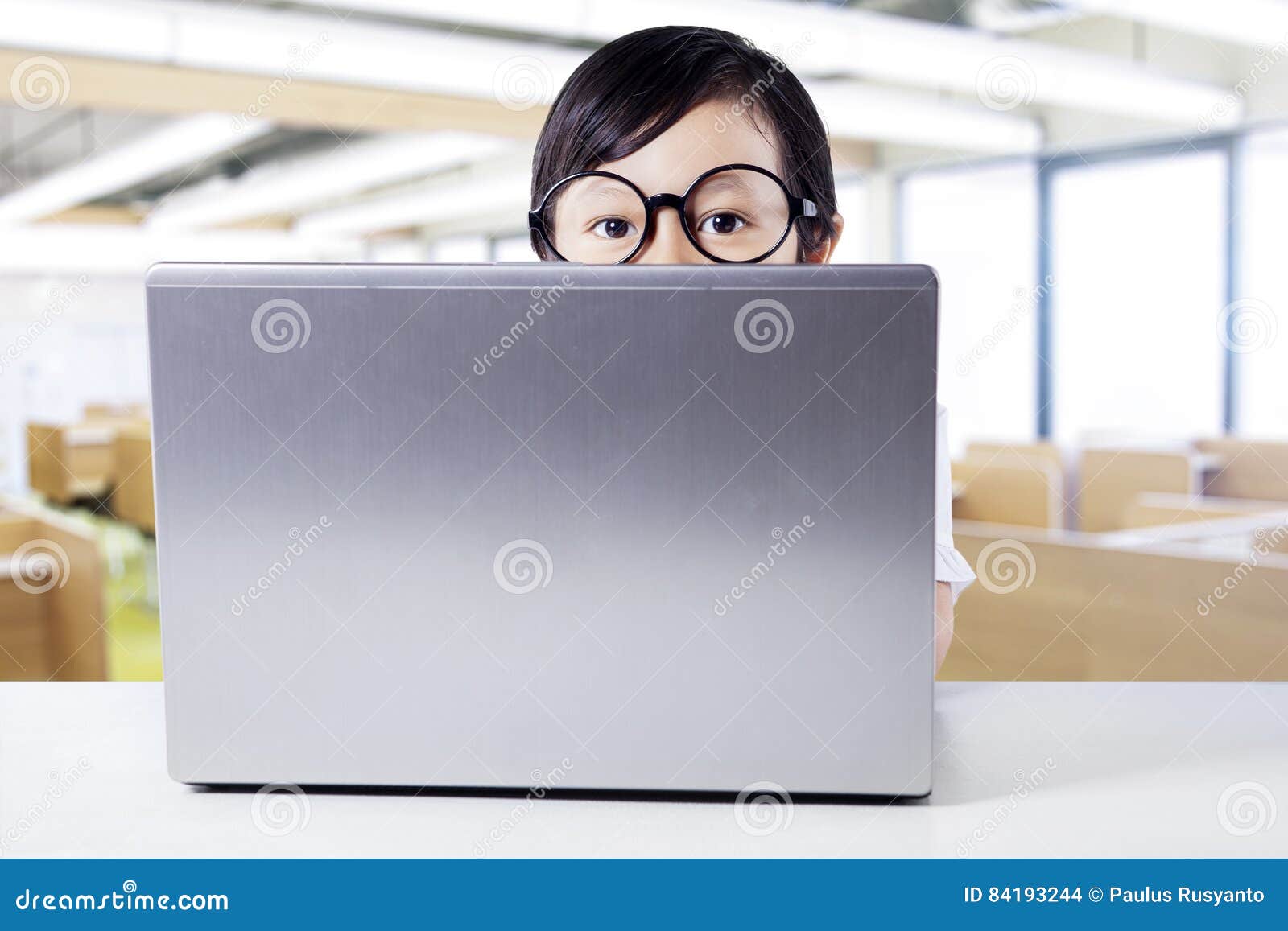 Child Peeping from the Back of Laptop Stock Photo - Image of child ...