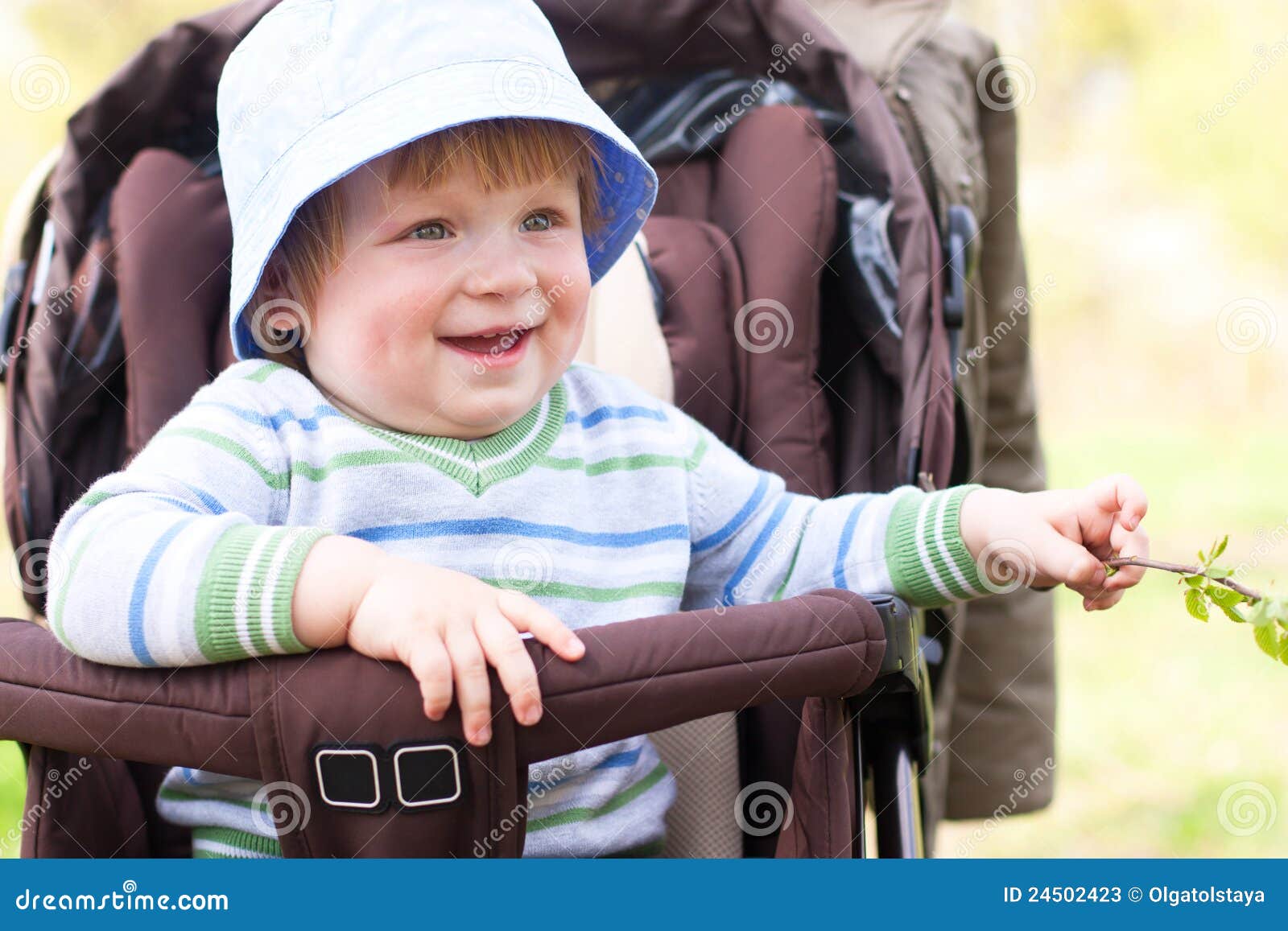Child in the perambulator stock image. Image of belt - 24502423