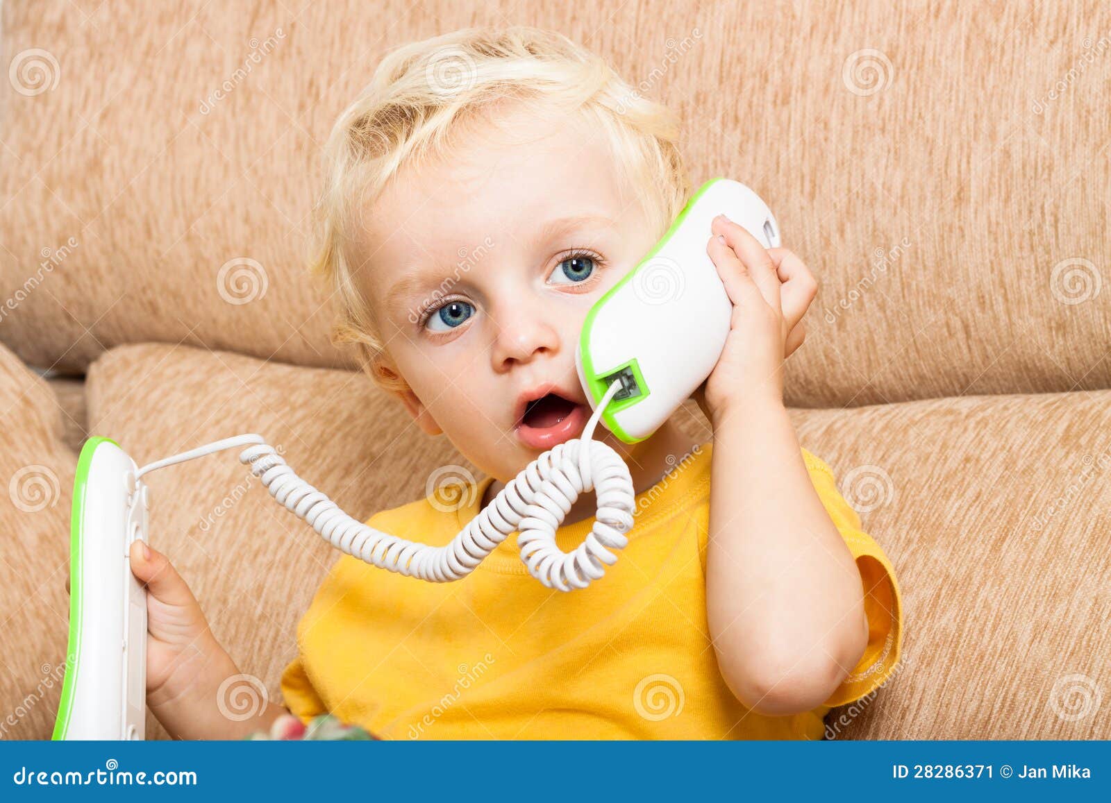 Child on the phone stock image. Image of blond, cute - 28286371
