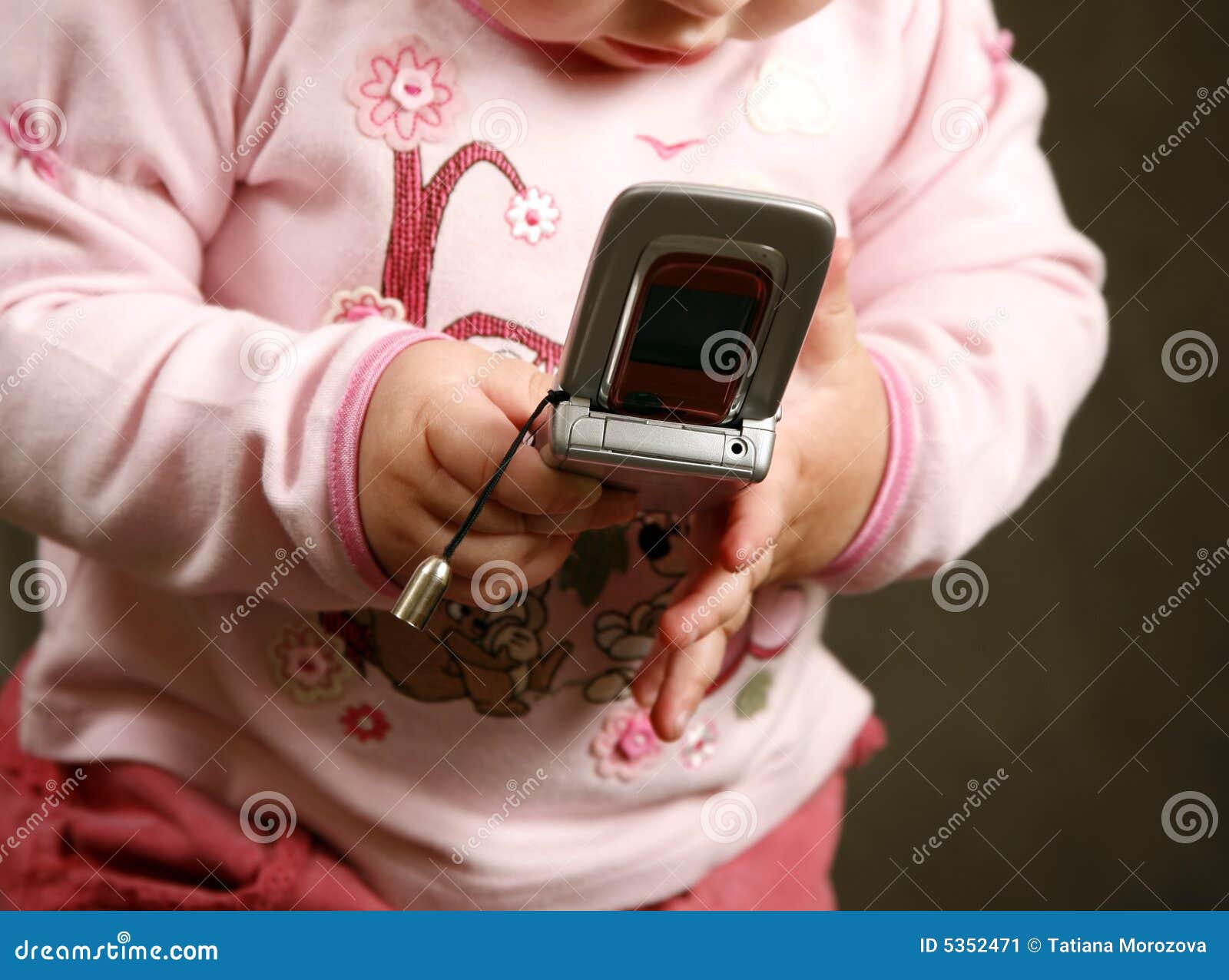 Child with the phone stock image. Image of hand, hold - 5352471