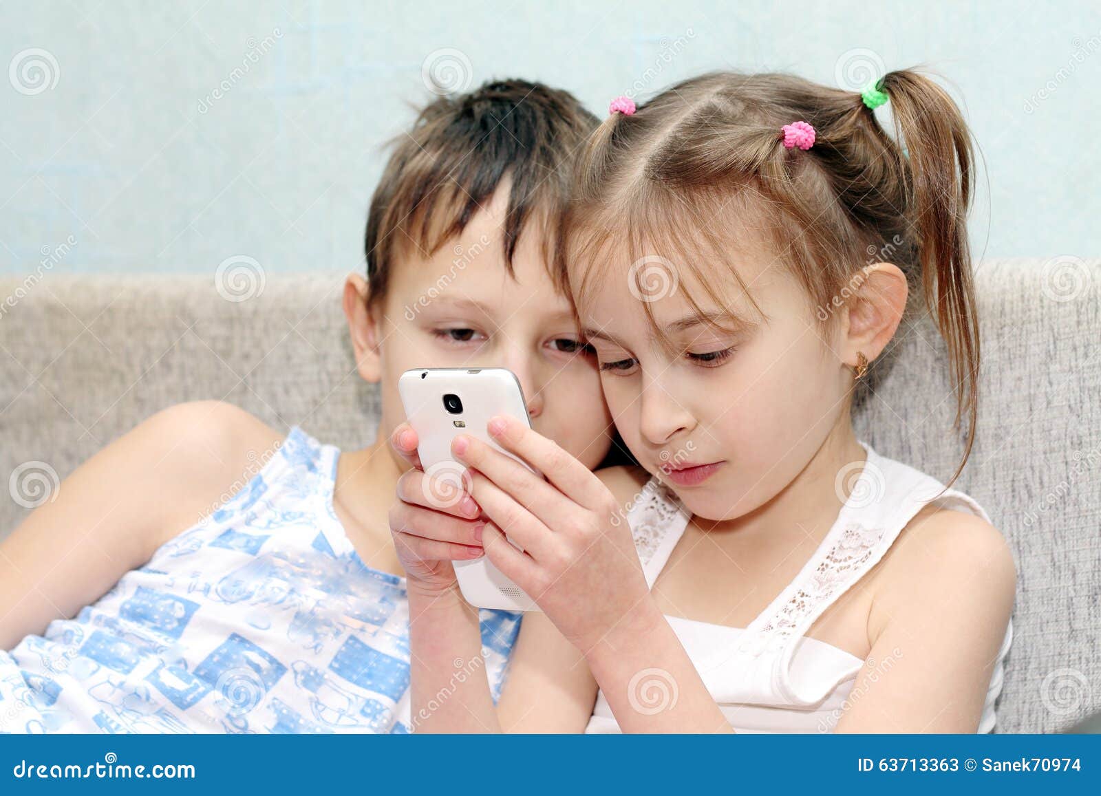 Child and phone stock image. Image of children, pigtails - 63713363