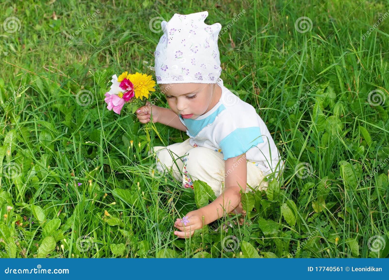 Child picking flowers stock image. Image of colorful - 17740561