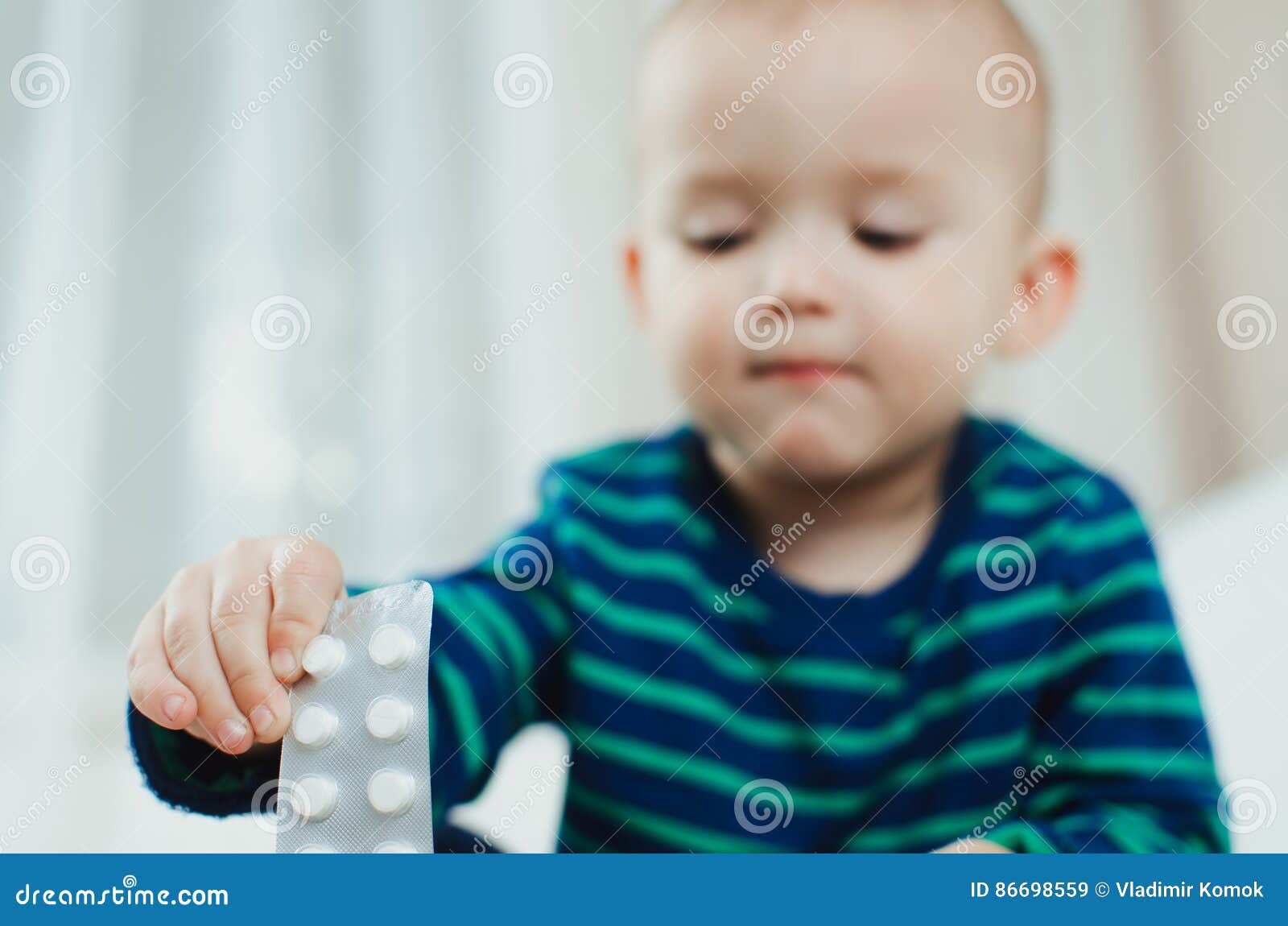 Child with pills stock image. Image of human, capsules - 86698559