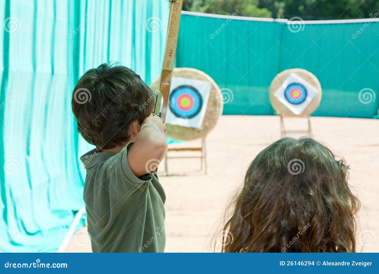 Child play archery stock photo. Image of village, brother - 26146294