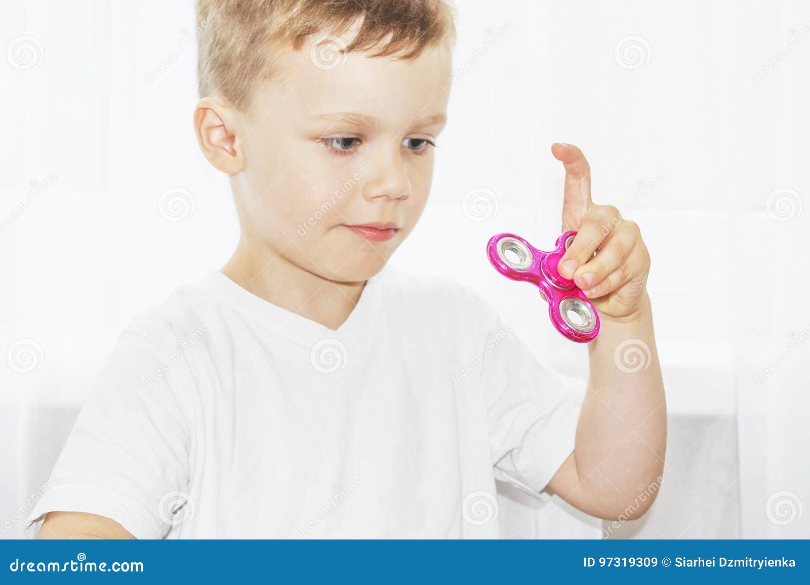 Child Play with Fidget Spinner Stress Relieving Popular Toy Stock Image ...