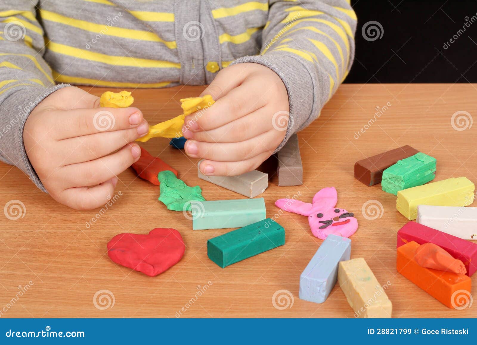 Child play with plasticine stock image. Image of playful - 28821799