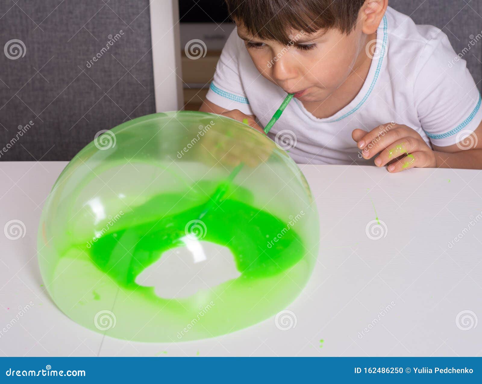 Child Play with Slime. Kid Squeeze and Stretching Slime. Stock Photo ...