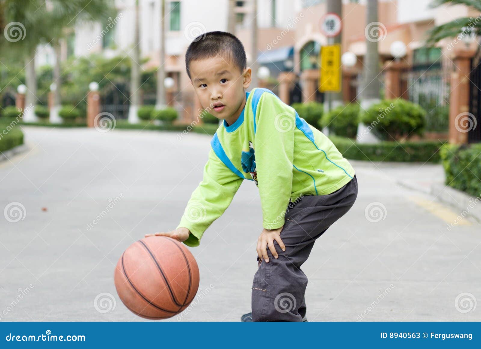 A child playing basketball stock image. Image of pretty - 8940563