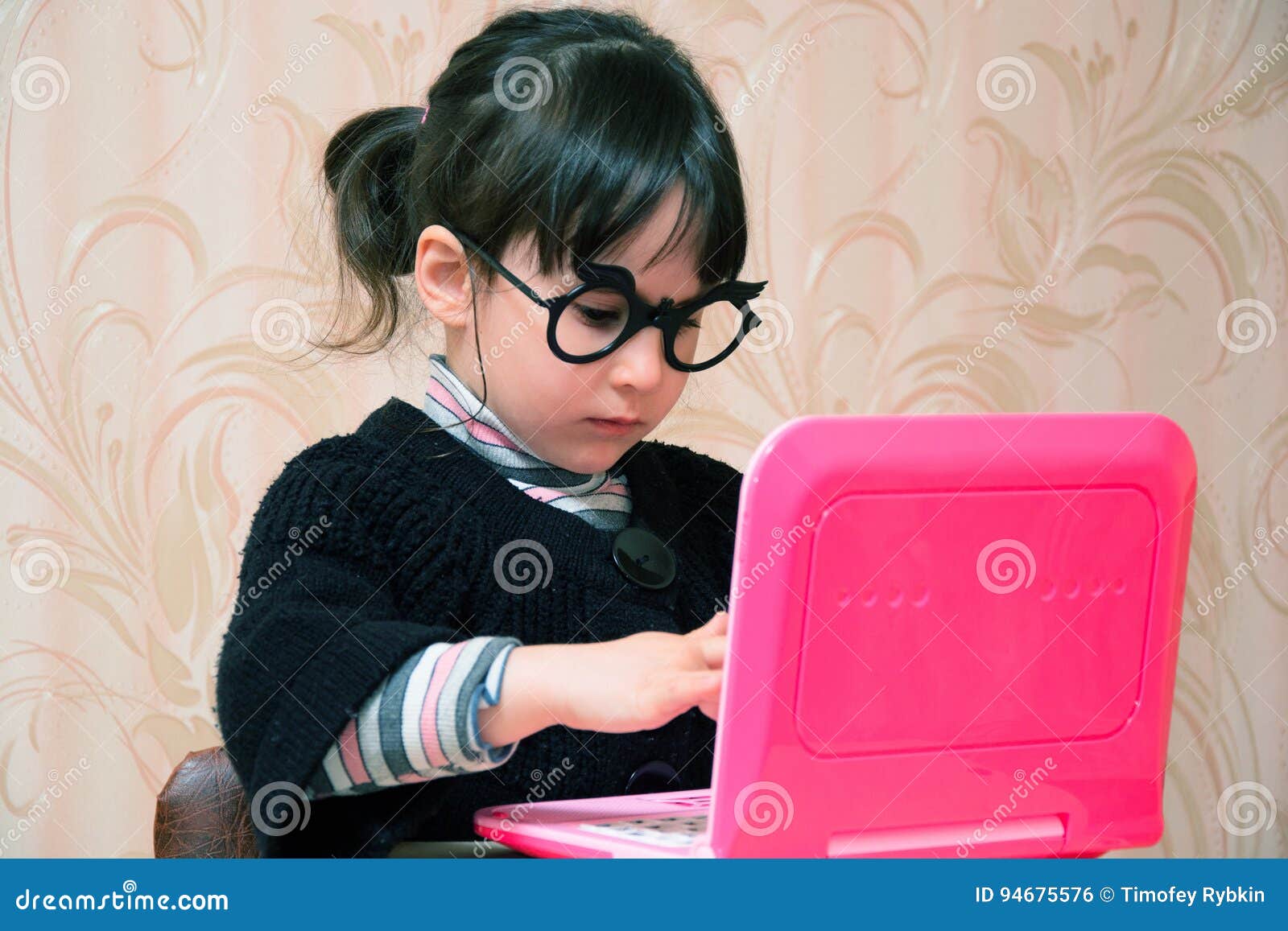Child Playing Behind a Pink Laptop Stock Photo - Image of screen, pure ...